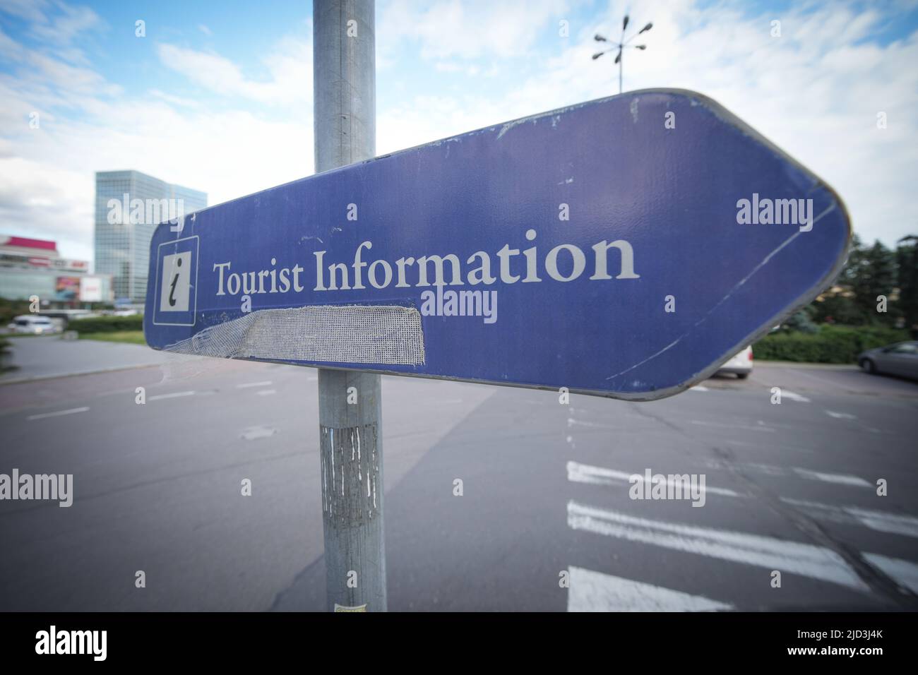 A tourist information arrow sign is seen in Warsaw, Poland on 14 June ...
