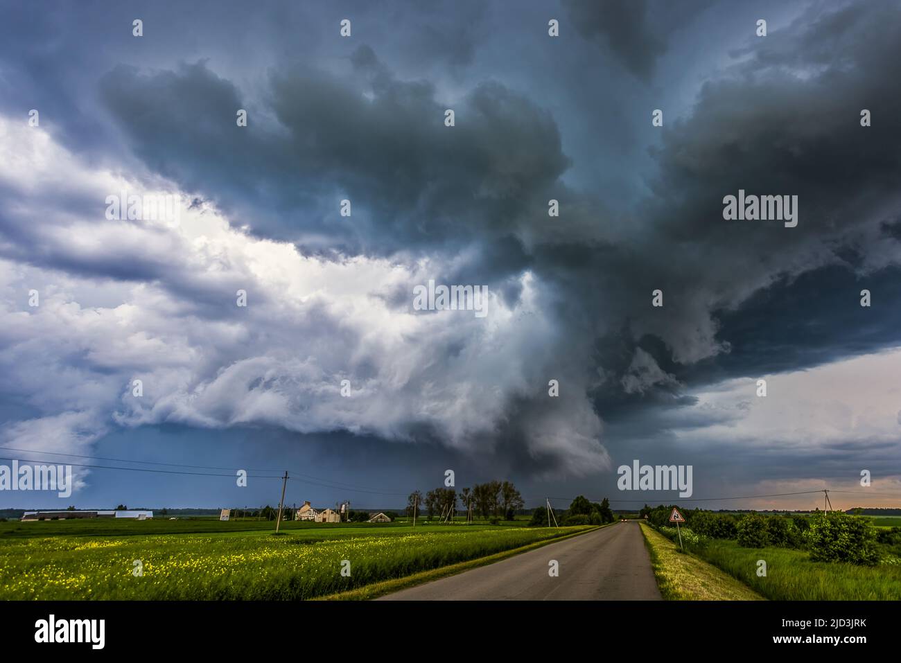 Storm clouds over field, tornadic supercell, extreme weather, dangerous ...