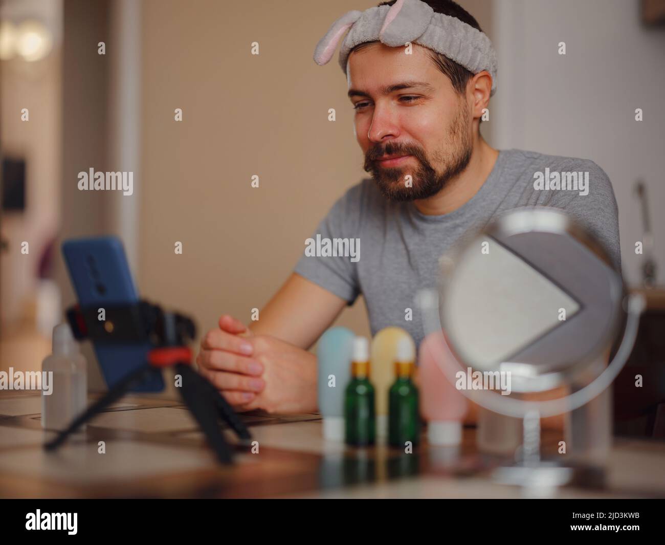 Men's beauty concept. caucAsian guy checking his skin. Beauty blogger ...