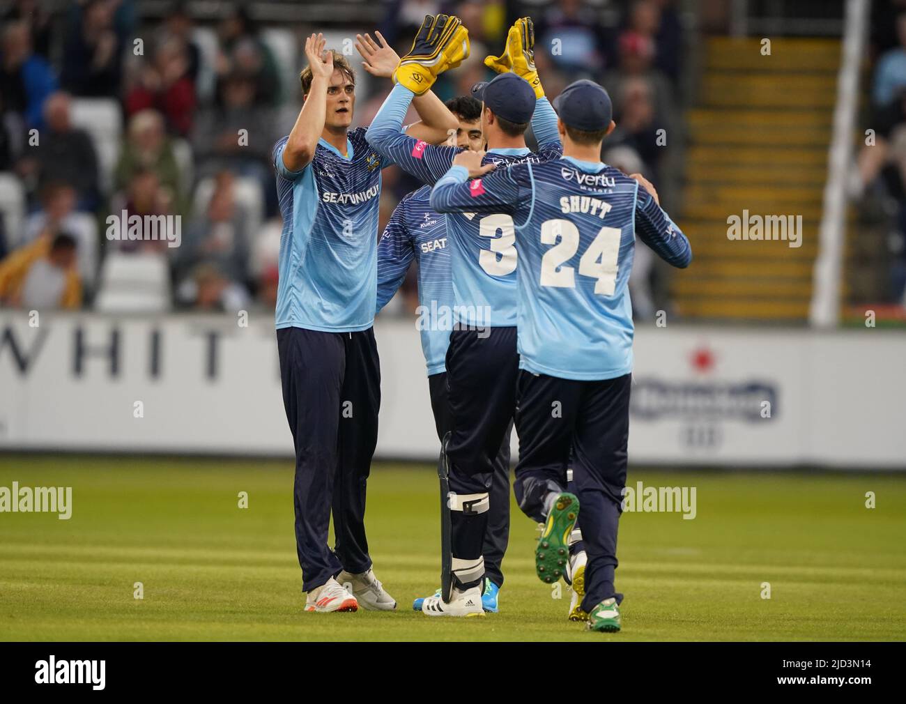 Yorkshire's Dom Leech (left) celebrtaes the wicket of Durham's Graham ...