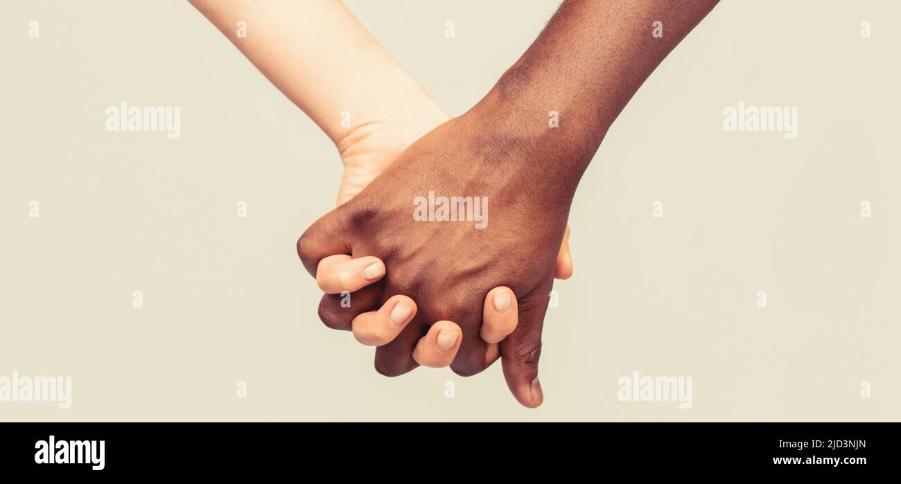 White Woman, African man Holding Hand Friendship Symbol. African Peace ...