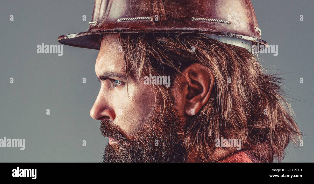 Building, industry, technology - builder concept. Bearded man worker ...
