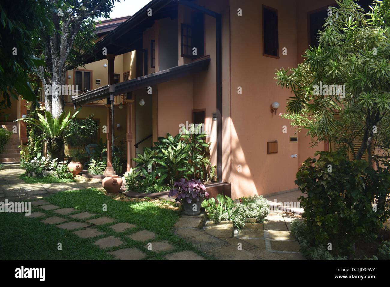 A landscaped garden with herbal trees, flowers, fruit trees, ponds ...