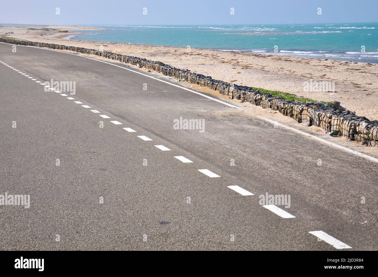 Asphalt road along the spit at Arichal Munai, Dhanushkodi, Tamil Nadu ...
