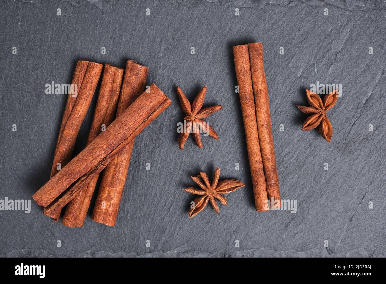 Spices cinnamon and star anise on slate stone background Stock Photo ...