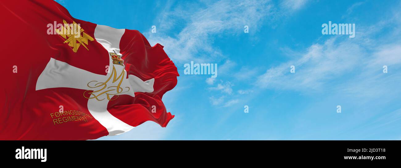 official flag of Signal Regiment , Denmark at cloudy sky background on ...