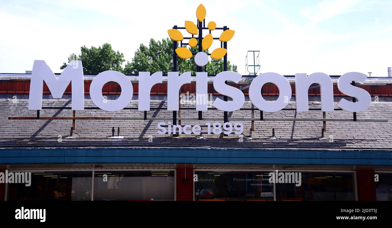 Exterior sign of a Morrisons supermarket in Chorlton-cum-Hardy ...