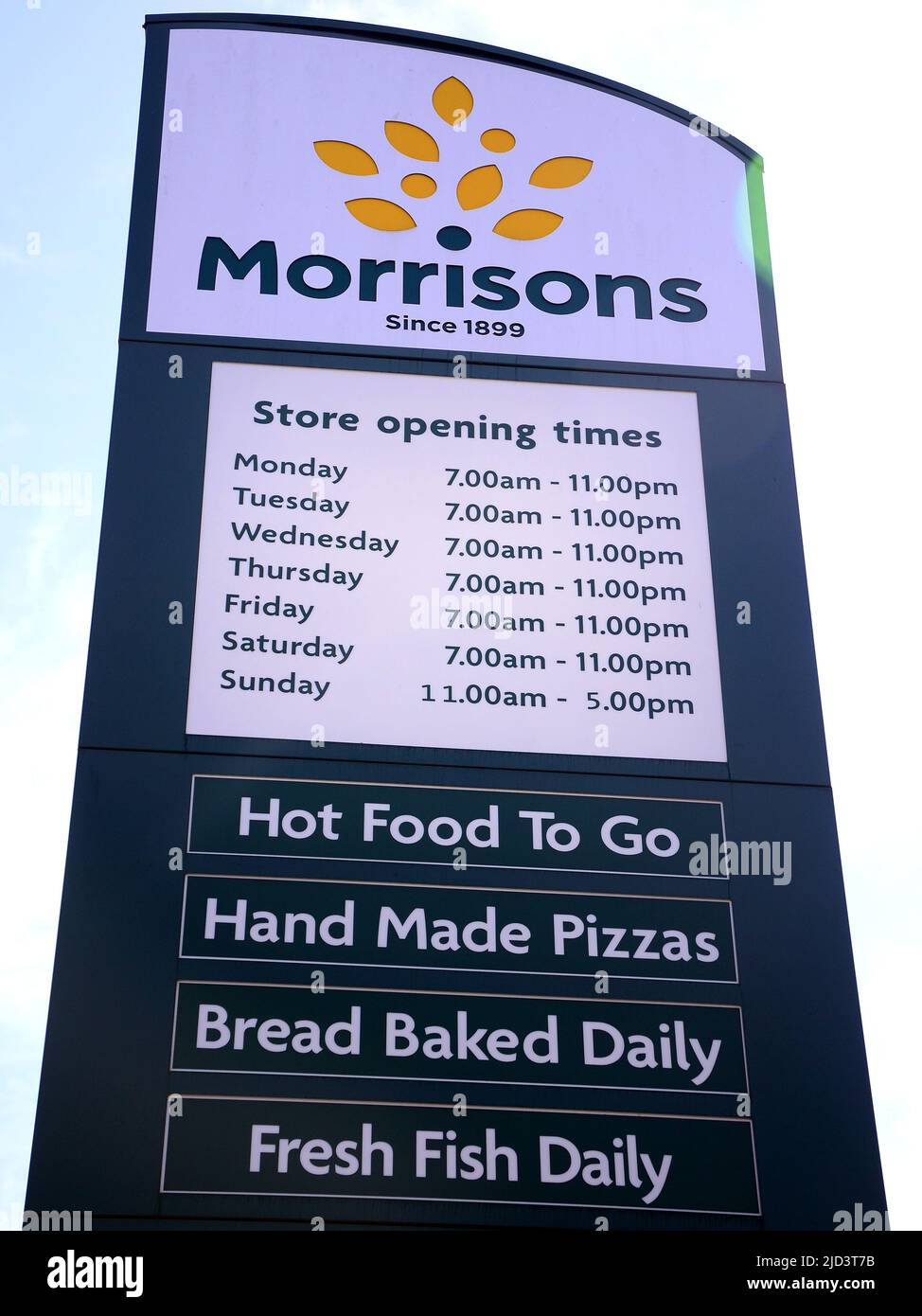Exterior sign of a Morrisons supermarket in Chorlton-cum-Hardy ...