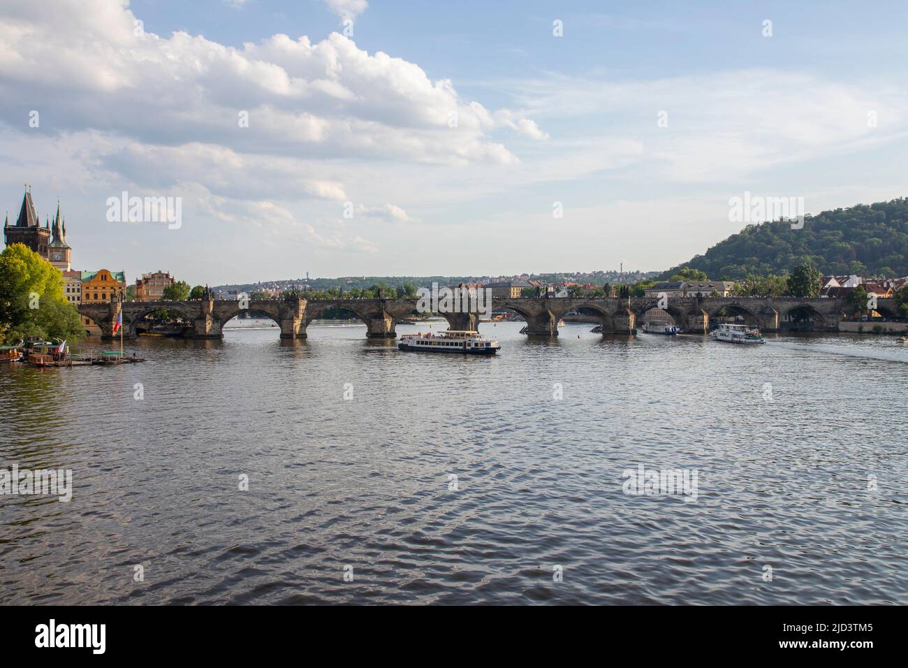 Charles Bridge is a medieval stone arch bridge that crosses the Vltava ...
