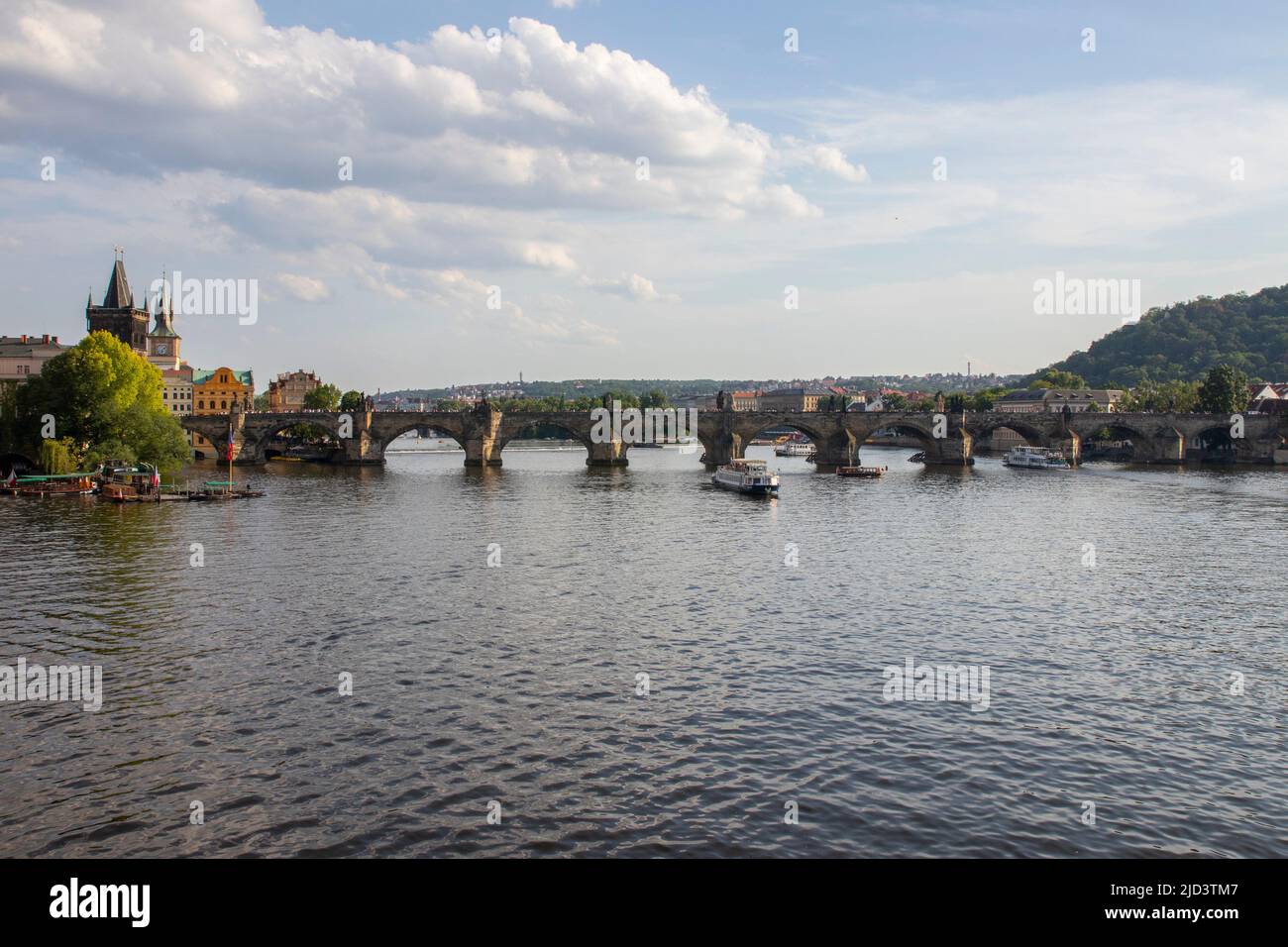 Charles Bridge is a medieval stone arch bridge that crosses the Vltava ...