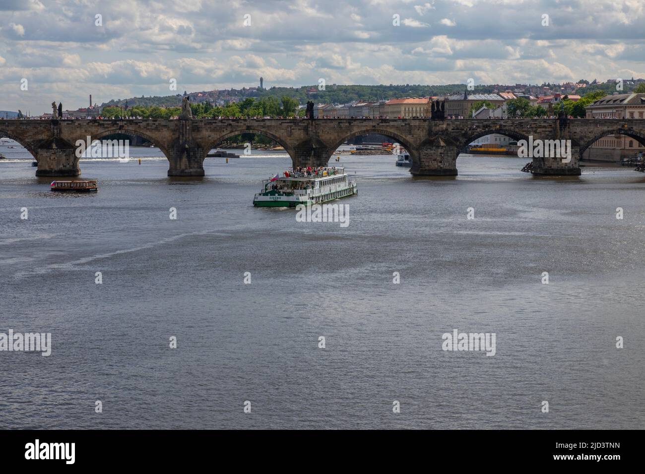 Charles Bridge is a medieval stone arch bridge that crosses the Vltava ...