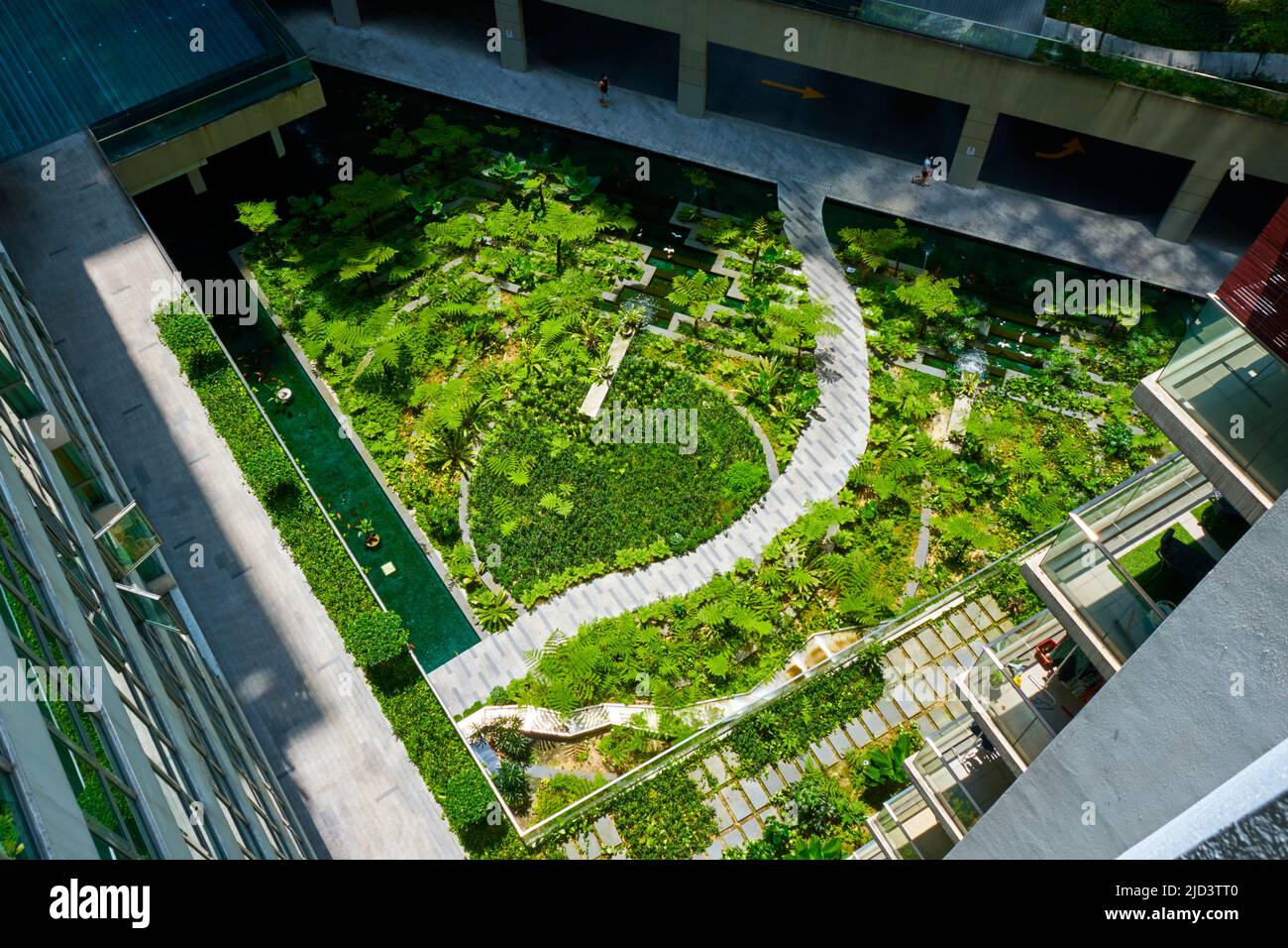 Green garden in the inner yard of residential building complex Stock ...