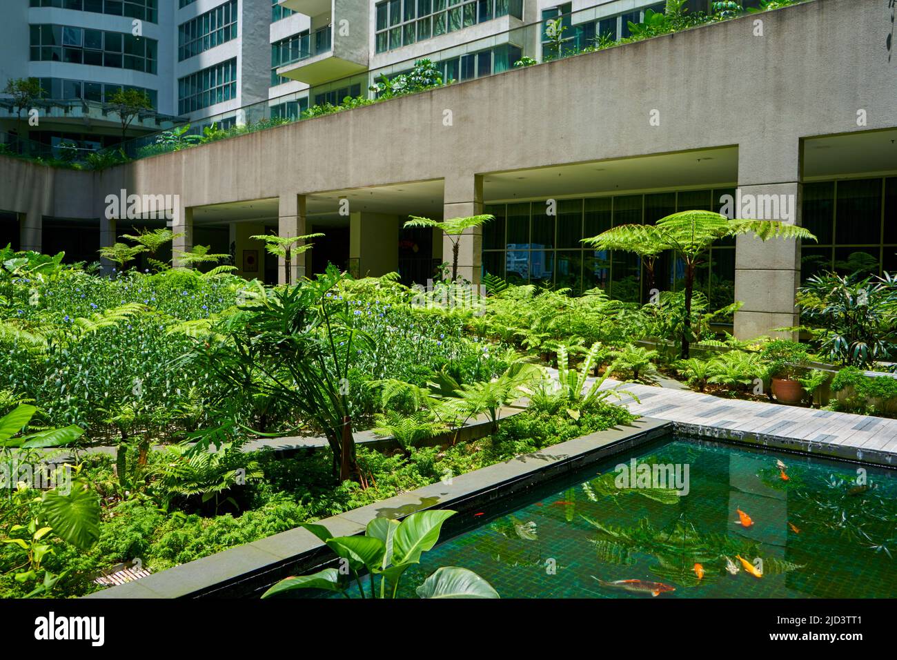 Green garden in the inner yard of residential building complex Stock ...