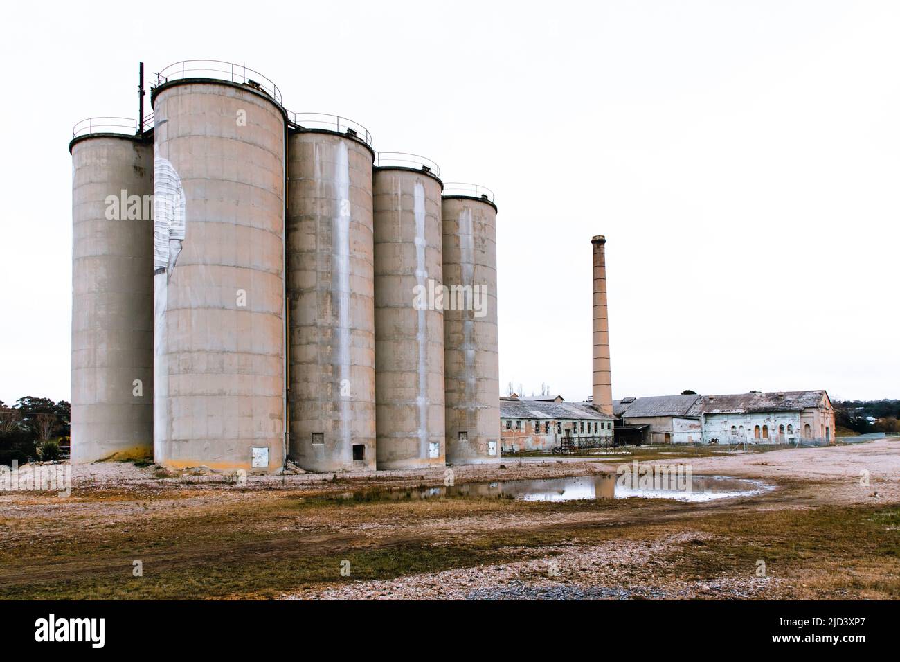 Photograph of the large cement storage silos at the now closed historic ...