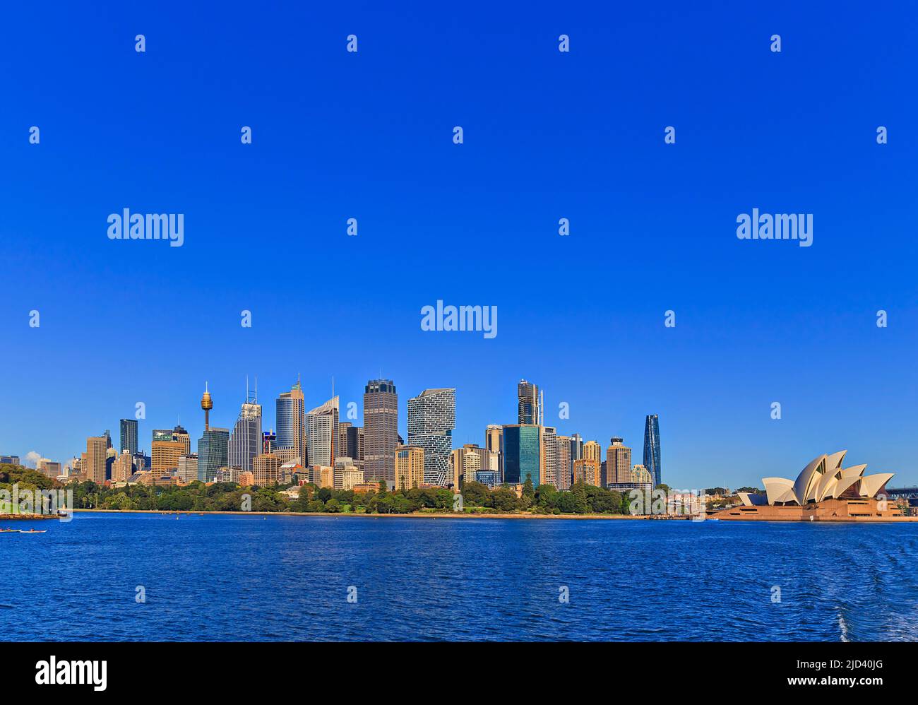 Skyline of City of Sydney cityscape from Harbour on a bright sunny day ...