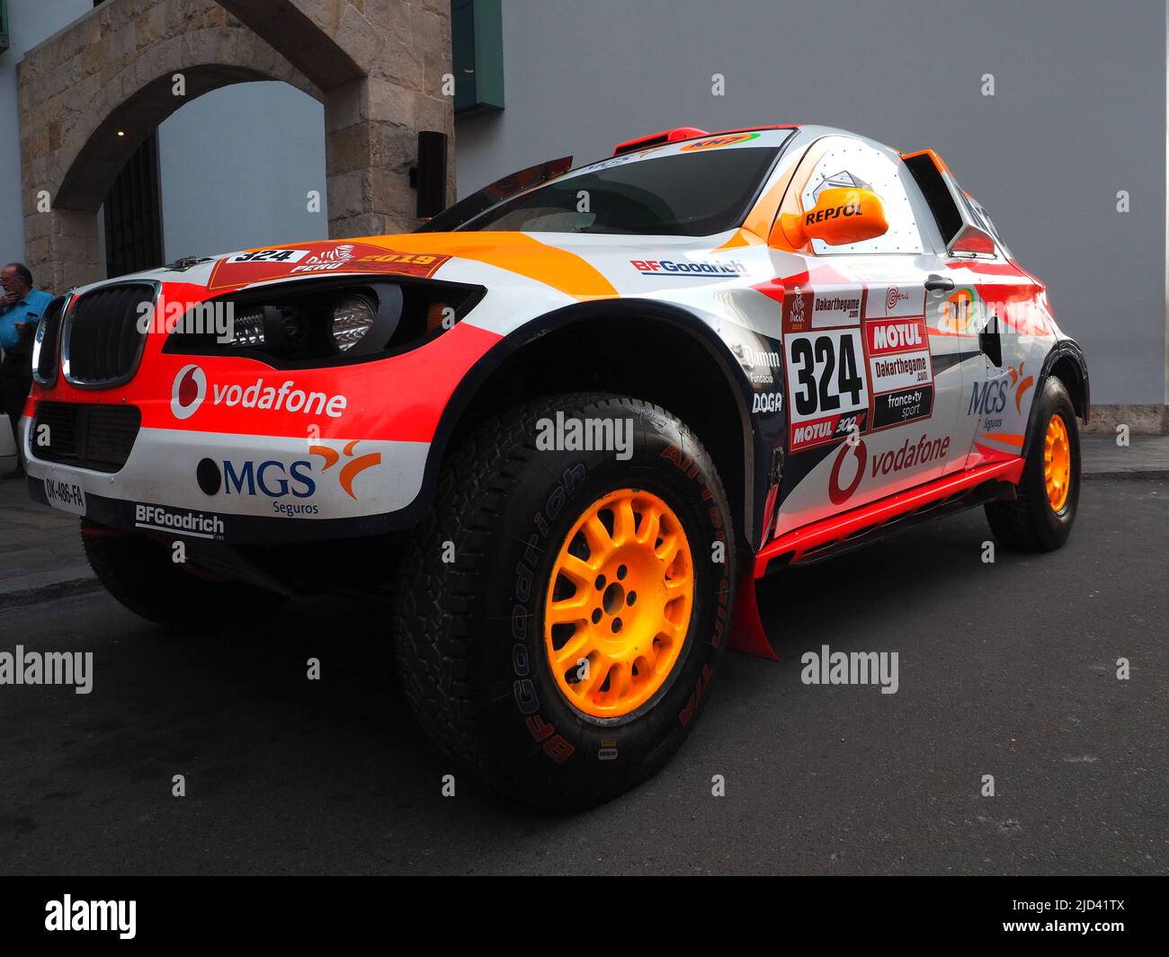 The BMW N° 324 racing car of Isidre Esteve, wheelchair rider, and Txema ...