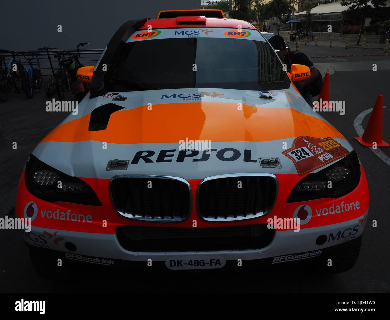 The BMW N° 324 racing car of Isidre Esteve, wheelchair rider, and Txema ...