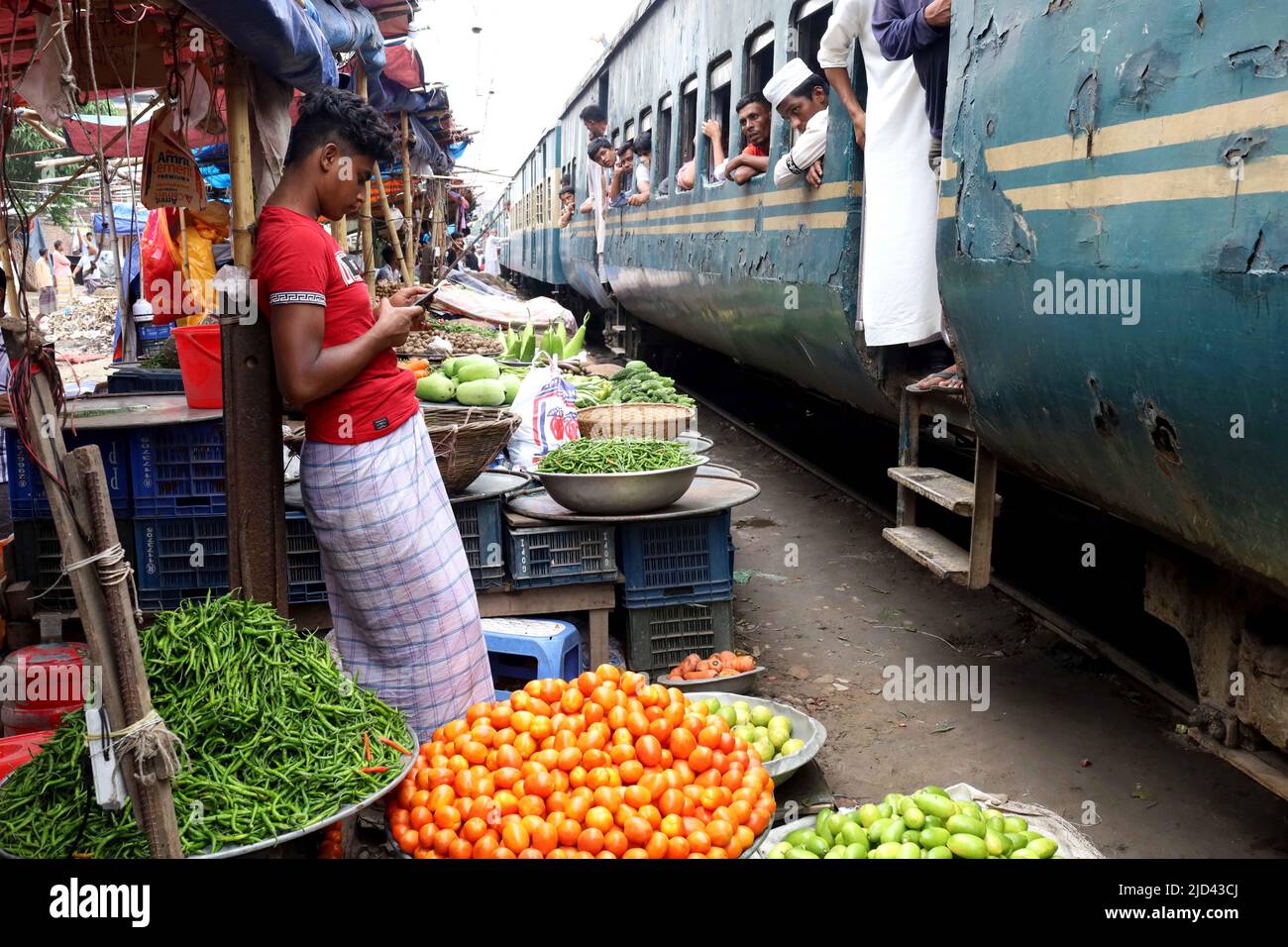 Dhaka, Dhaka, Bangladesh. 16th June, 2022. A commuter train passing ...