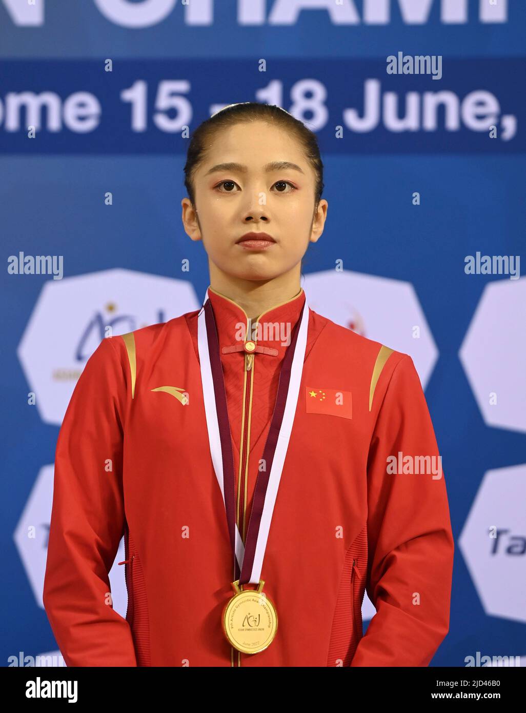 Doha. 17th June, 2022. Gold medalist Wei Xiaoyuan of China reacts during the awarding ceremony ...