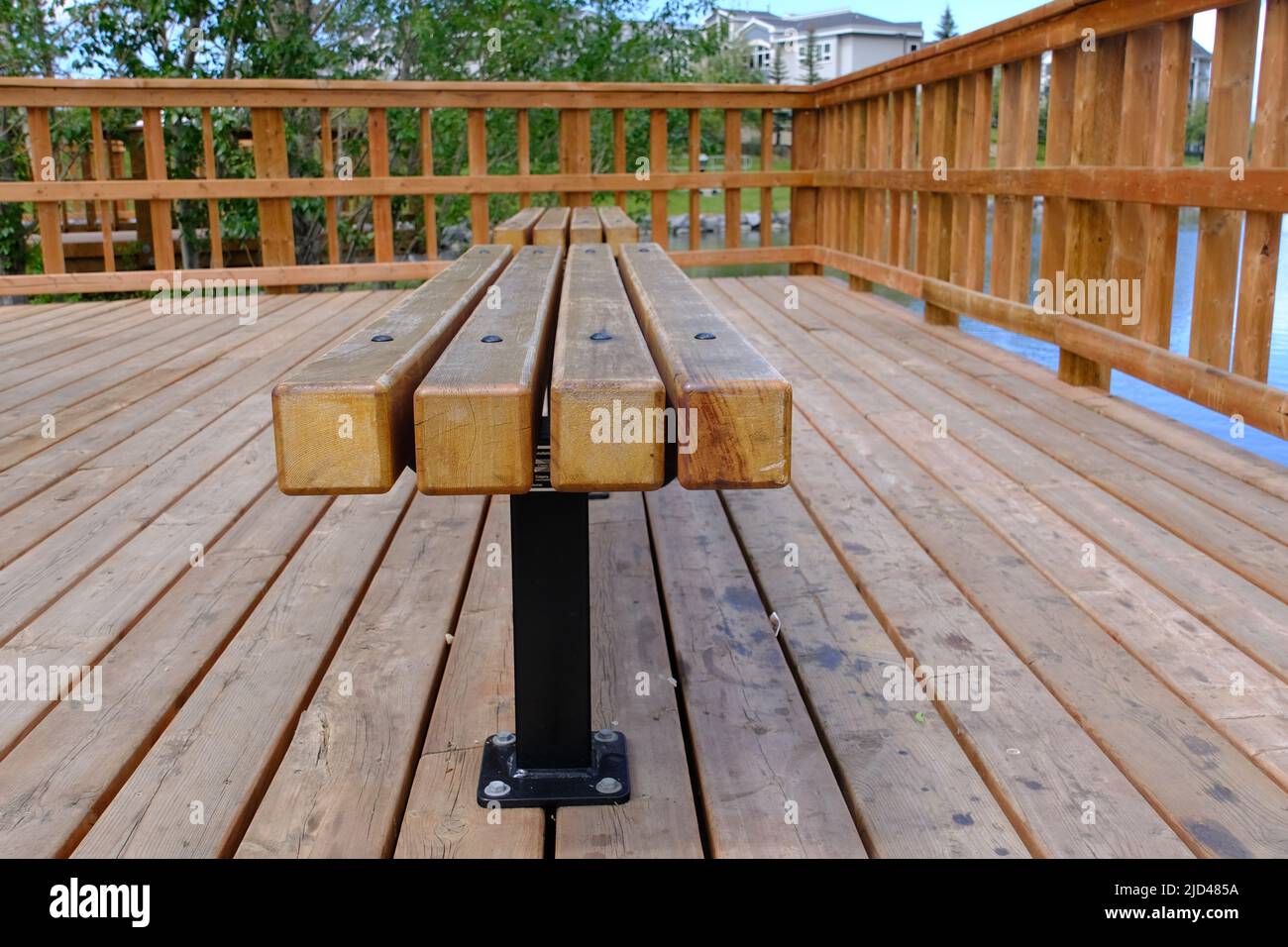 Park bench on wood decking - outdoor concept Stock Photo - Alamy