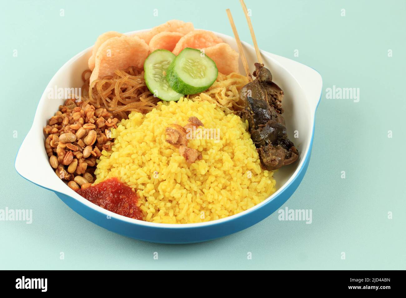 A Plate of Nasi Kuning or Yellow Rice, Favorite Indonesian Menu for ...