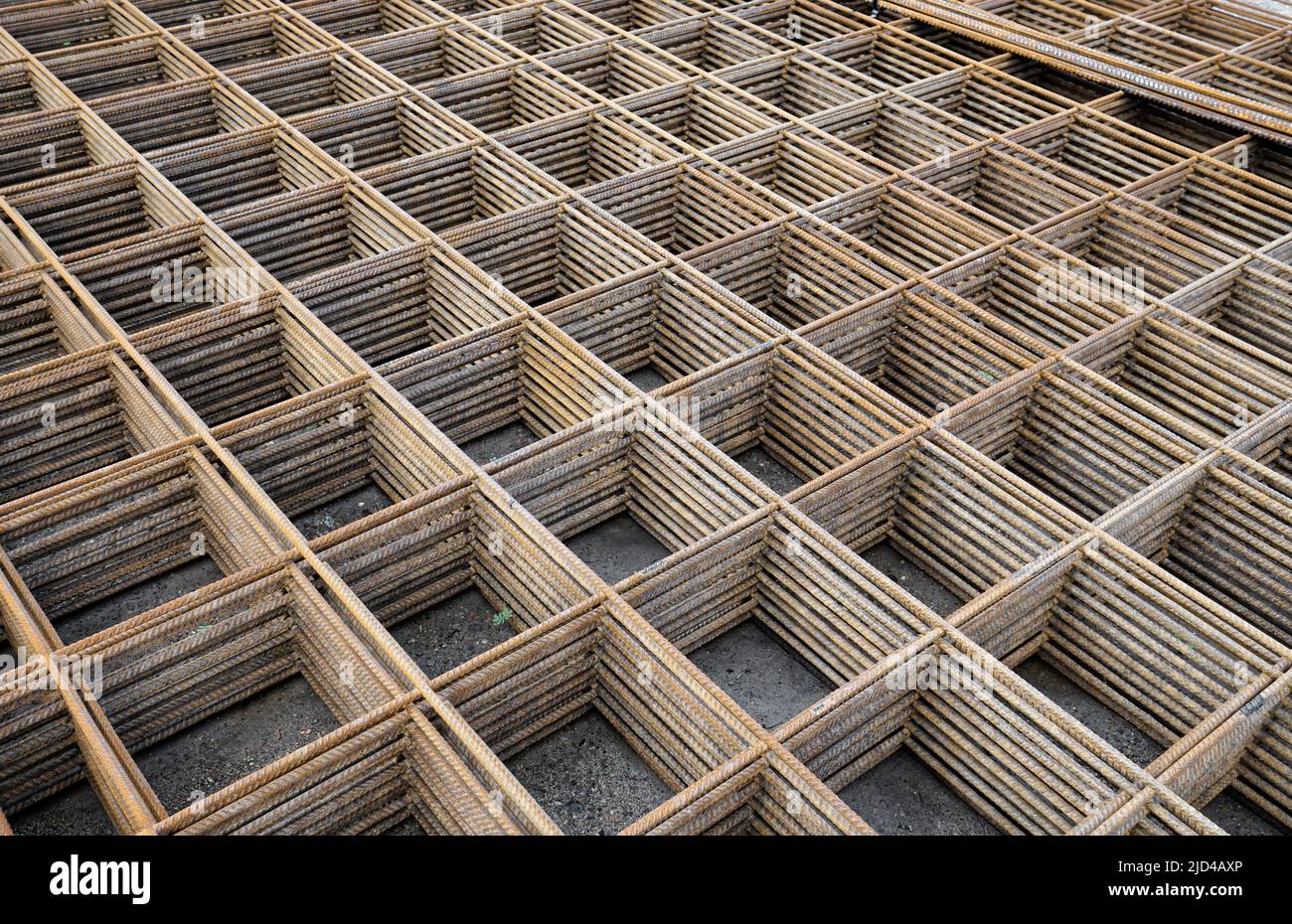 Stacked steel wire mesh for slab concrete work at the construction site ...