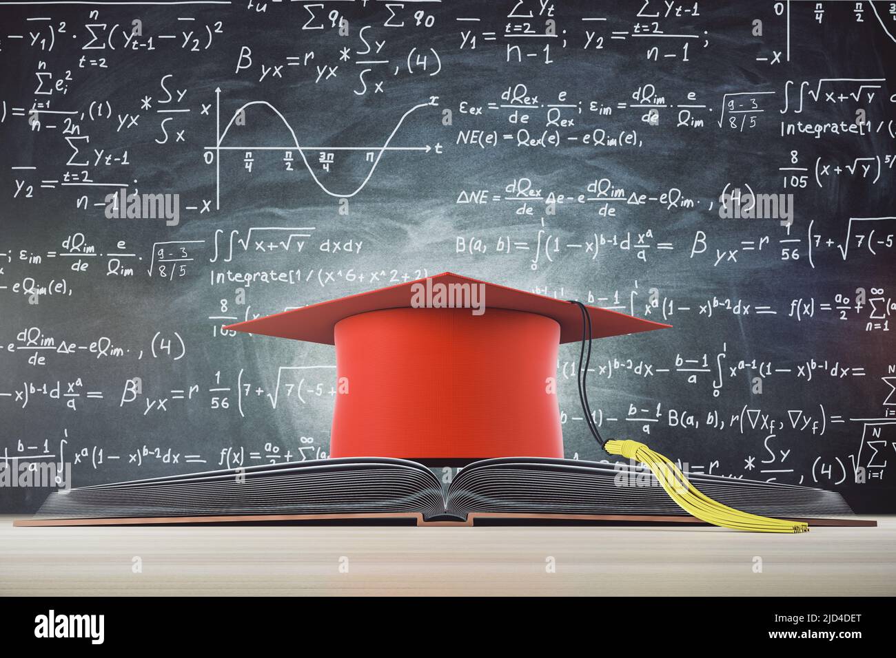 Graduation and knowledge concept with red mortarboard hat on opened ...