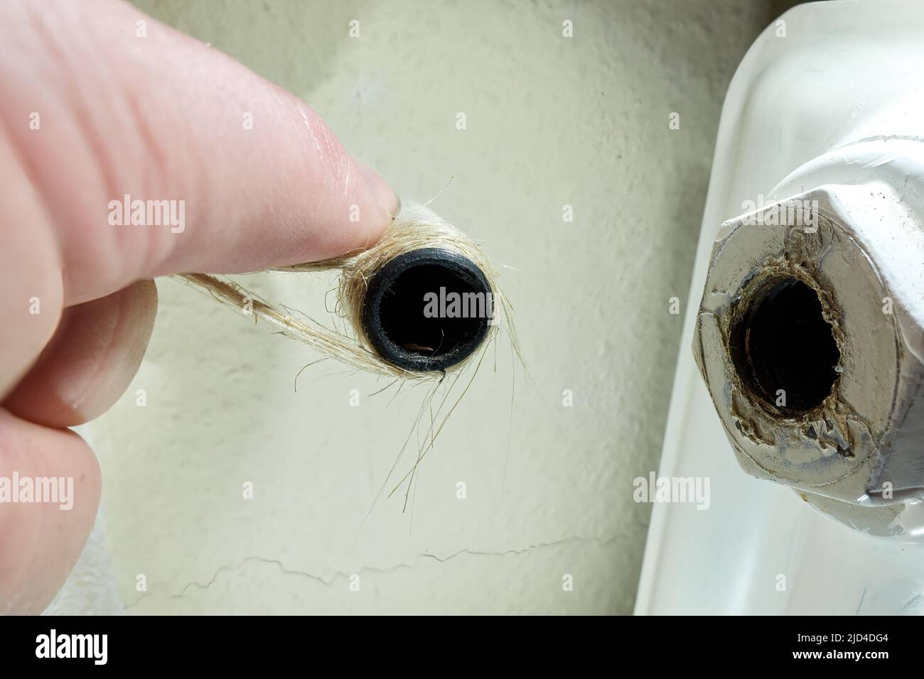 Seal heating pipe with hemp. Replace thermostat valve on radiator ...