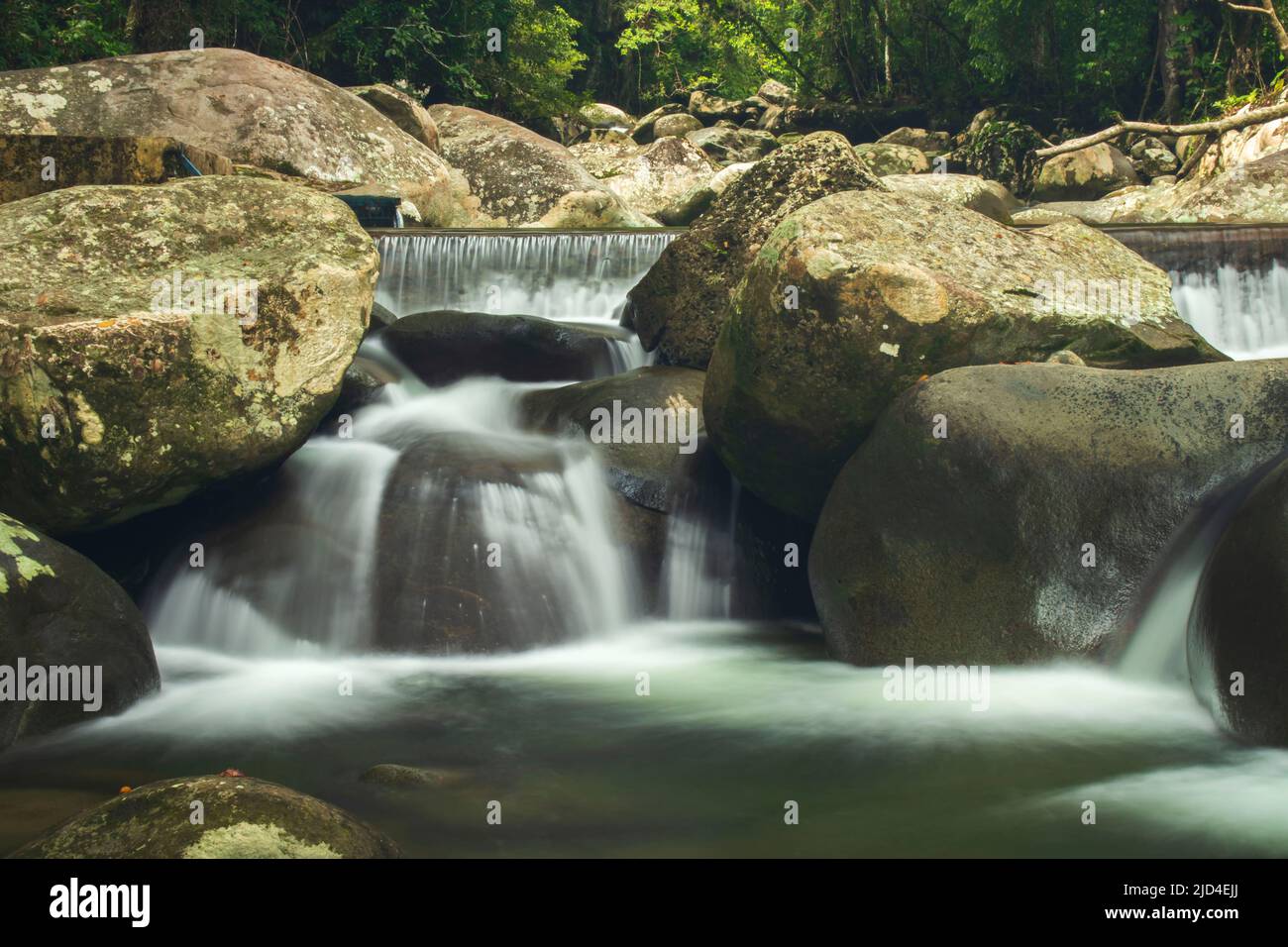 Photo of water flowing between rocks, Mountala river, Aceh, Indonesia ...