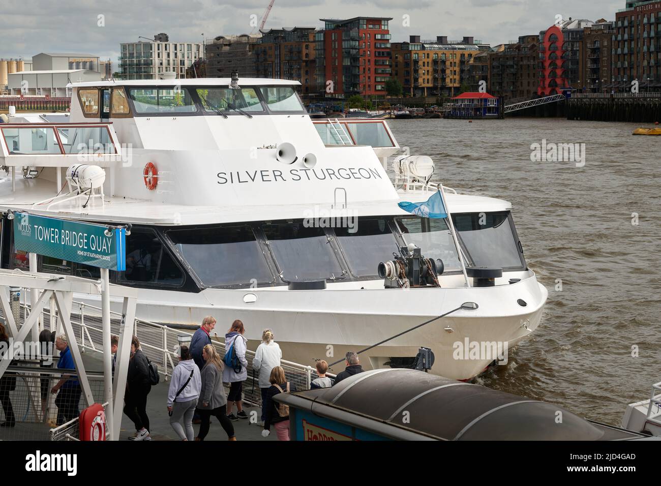 The Silver Sturgeon cruise boat moored at Tower Bridge Quay, London ...