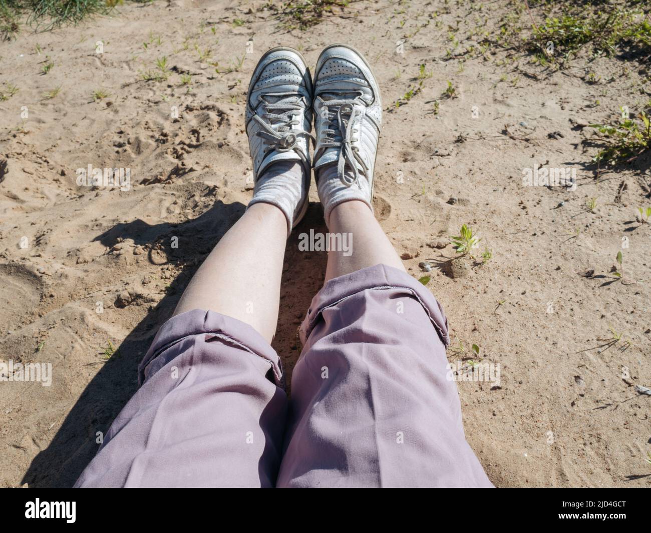 Wearing white trainers hi-res stock photography and images - Alamy