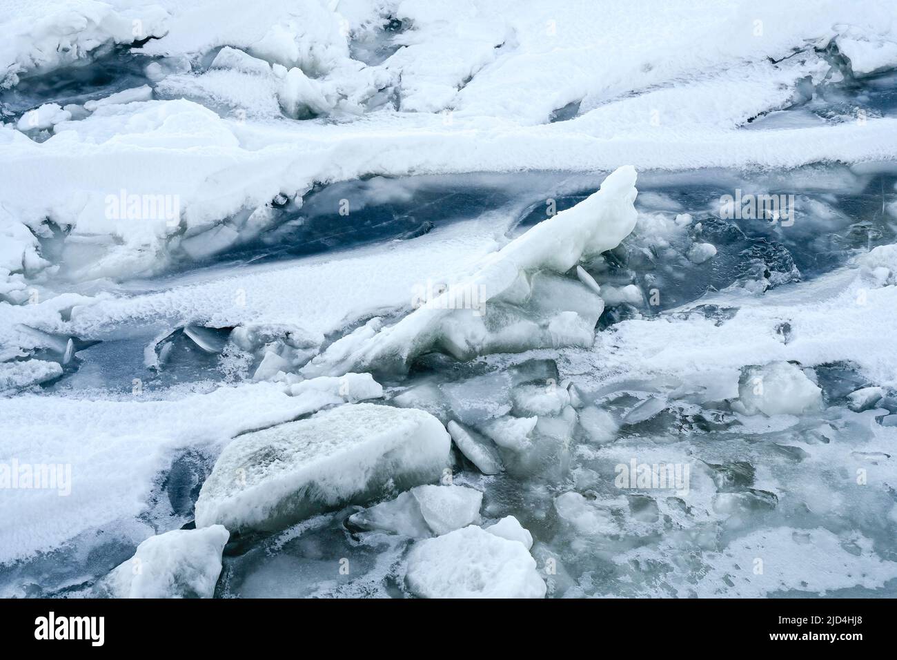 Lumps of ice and snow floating on thawing sea water Stock Photo - Alamy