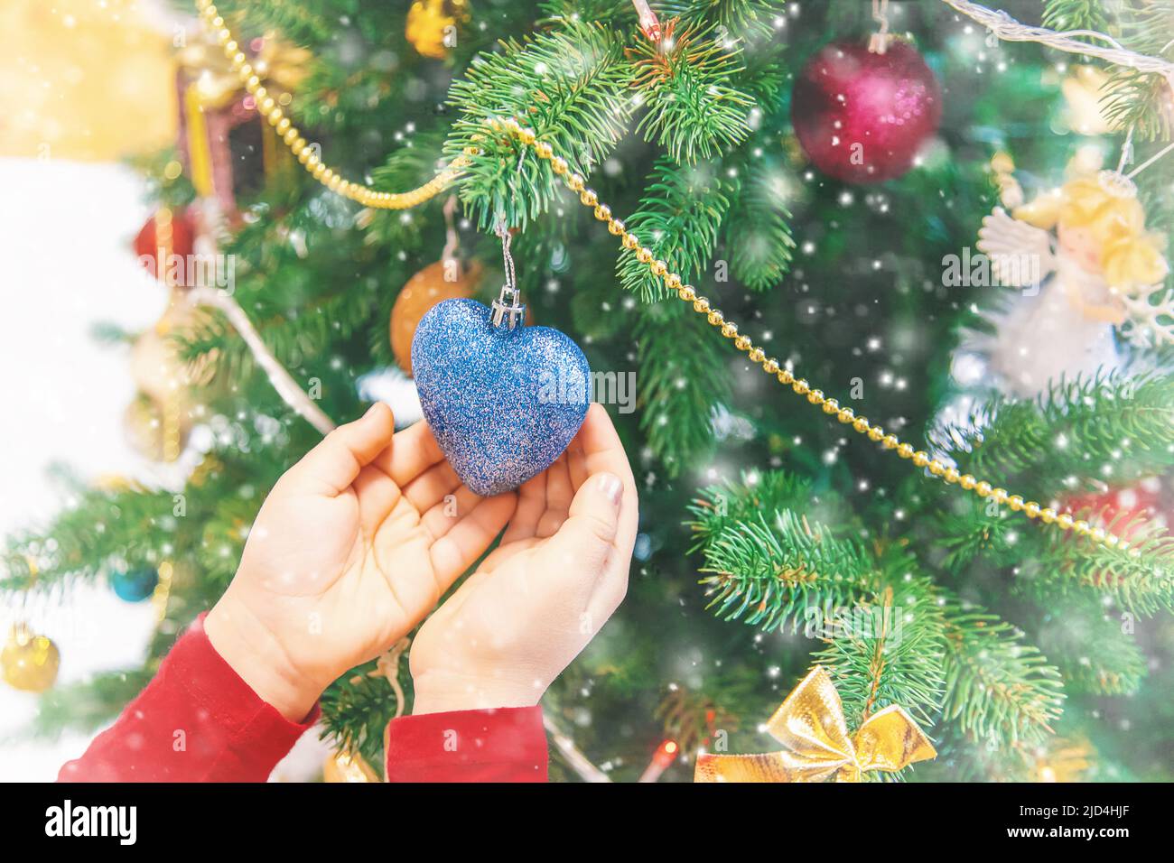 Child happy over christmas background. Christmas tree. Selective focus ...