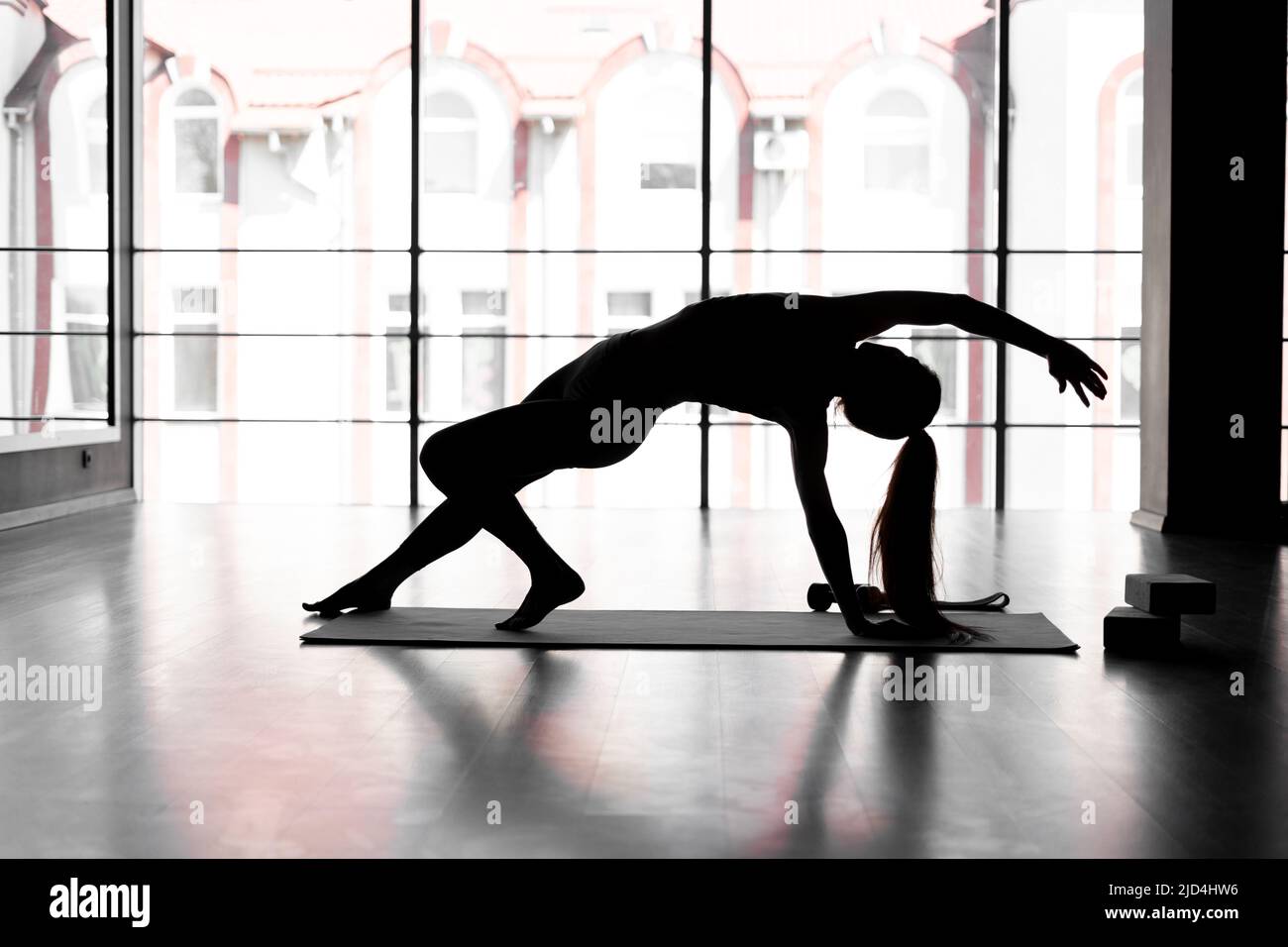 woman lotus pose yoga Padmasana posture position in silouhette on ...