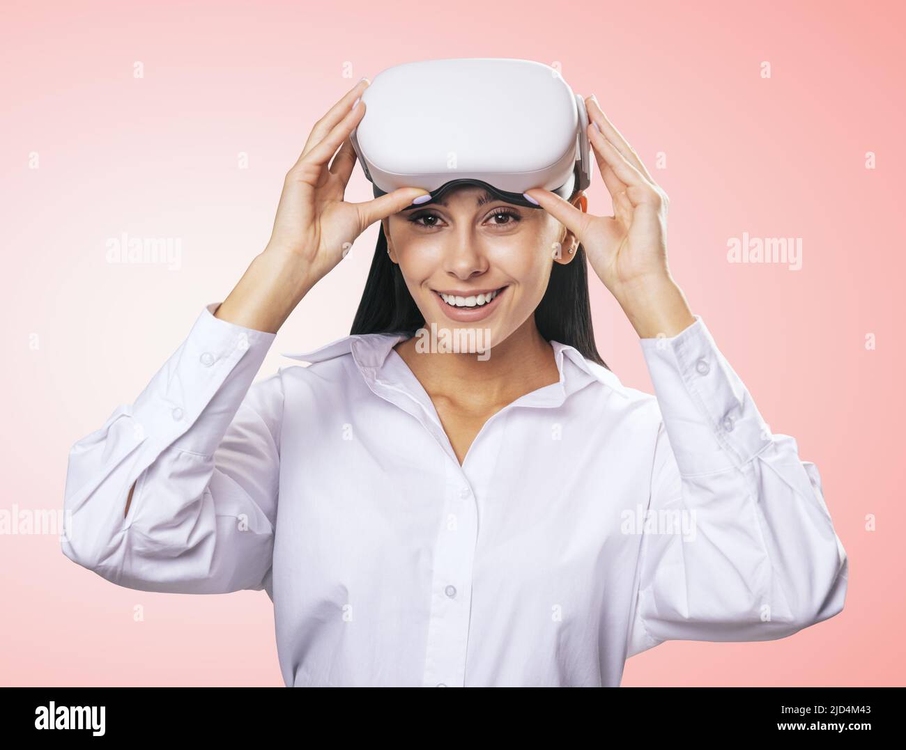 Virtual reality concept: smiled young girl in light shirt with white VR ...