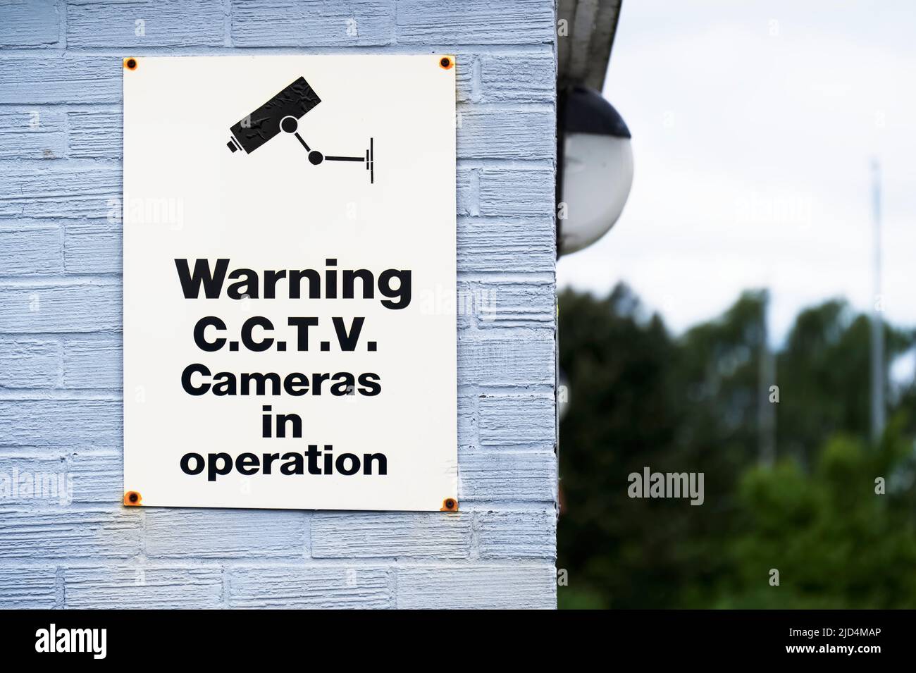 CCTV in operation 24 hours premises protected sign Stock Photo - Alamy
