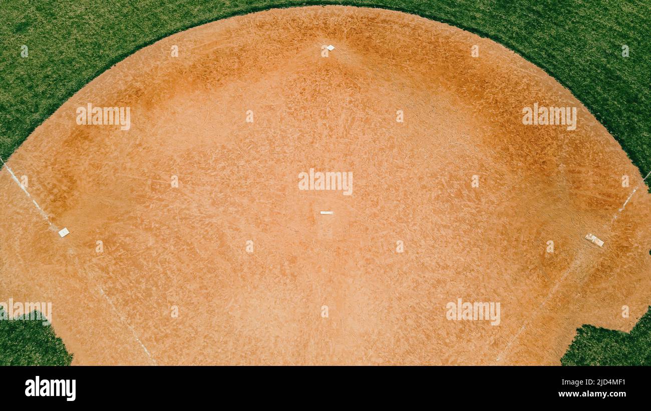 Fresh grass grows in the spring around the baseball fields at a local ...