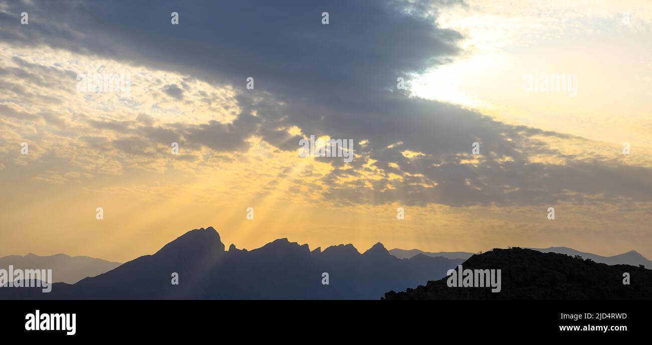 Spectacular blue sky with cumulus clouds and sun rays, backlight ...