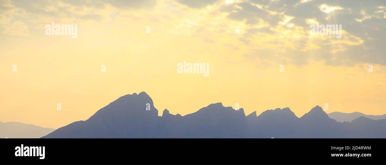 Spectacular blue sky with cumulus clouds and sun rays, backlight ...