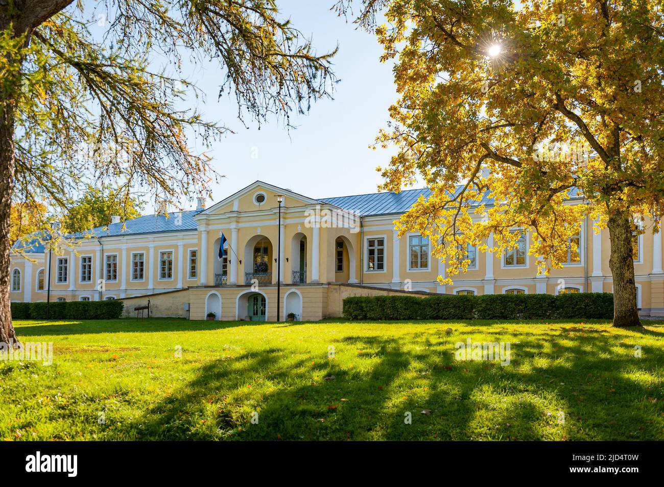 Front facade of Vääna Manor. Sunny autumn weather drew tourists and ...