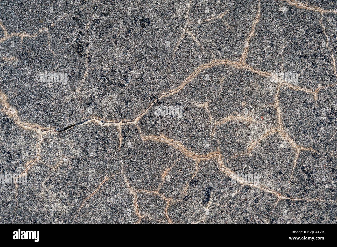 Old worn asphalt. The texture of the cracked asphalt Stock Photo - Alamy