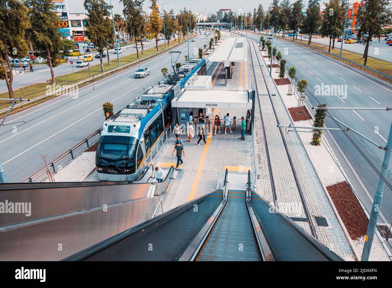 19 May 2022, Antalya, Turkiye: Electric eco tram at the stop boarding ...