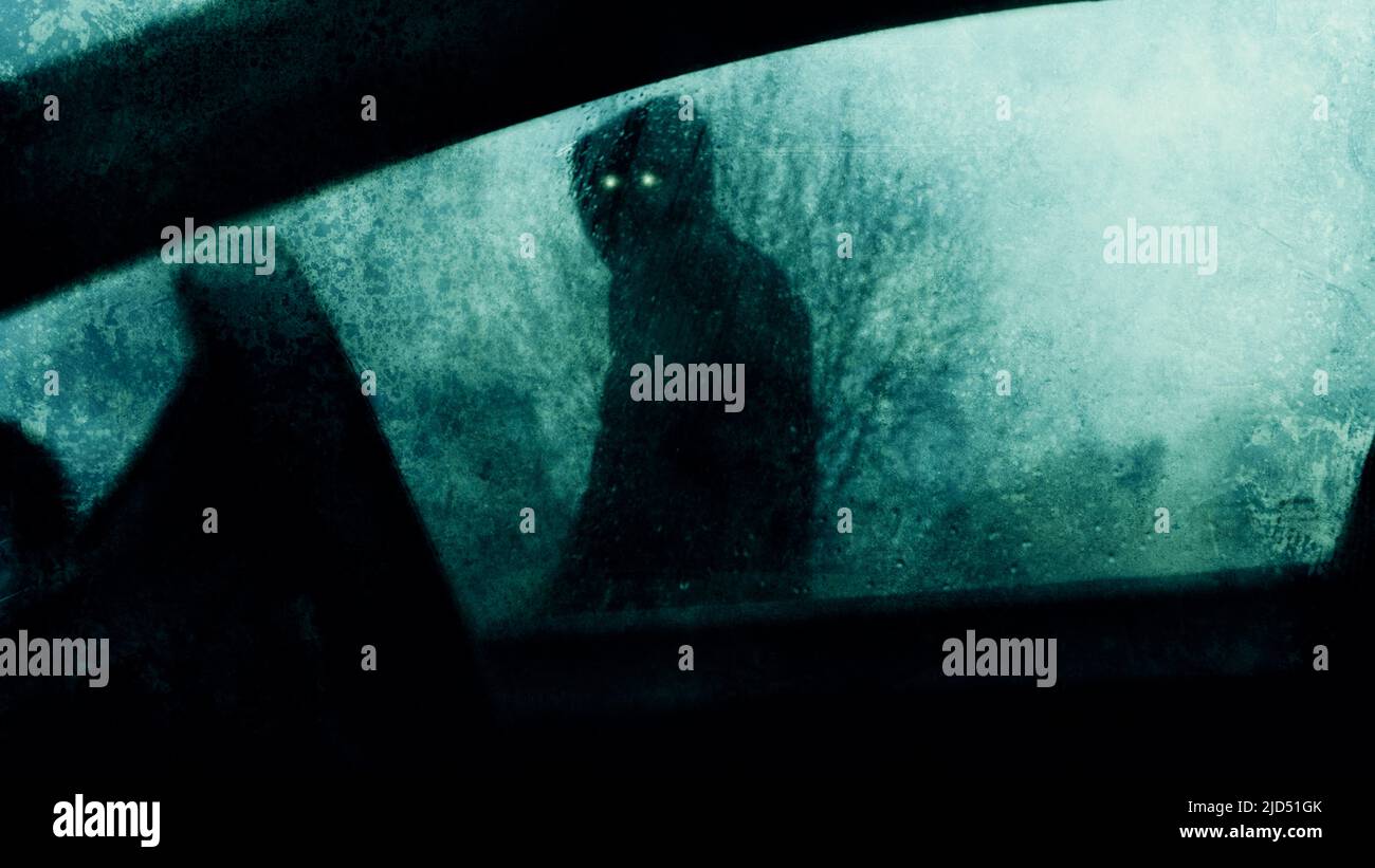 A horror concept of a spooky supernatural figure with glowing eyes ...