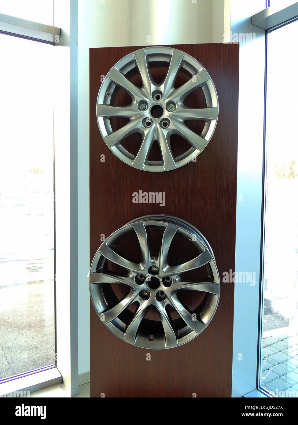 Metallic Painted Wheel Rims Showing At Car Parts Store Stock Photo - Alamy