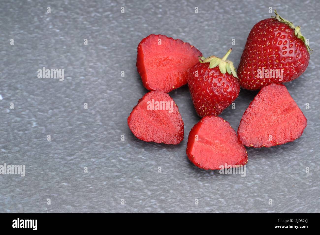 grey background with strawberry and copy space Stock Photo - Alamy