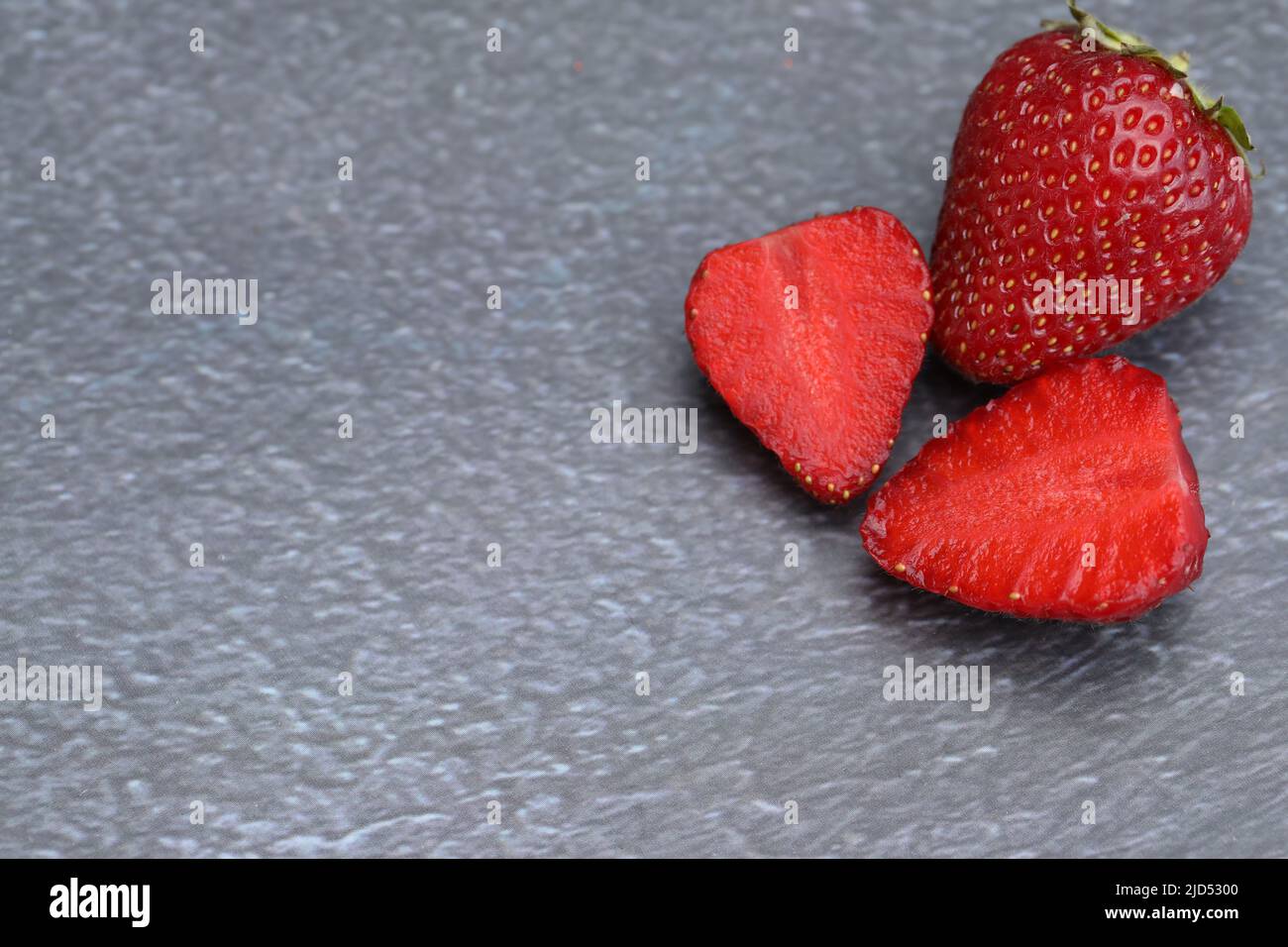 grey background with strawberry and copy space Stock Photo - Alamy