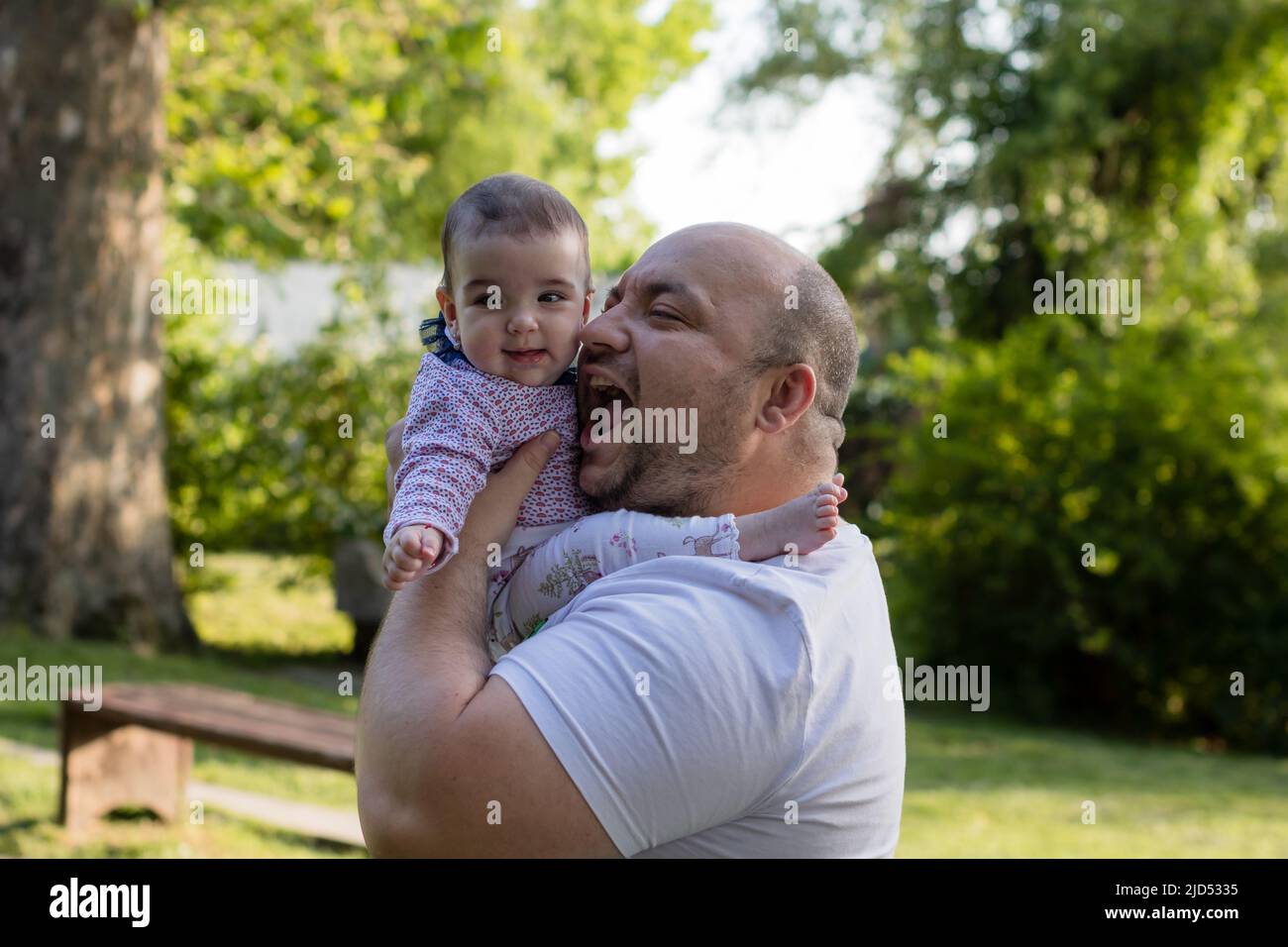 Dad and little baby girl having fun Stock Photo - Alamy