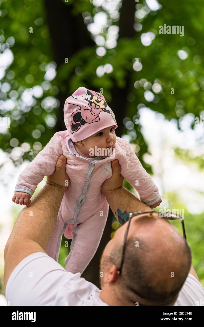 Dad and little baby girl having fun Stock Photo - Alamy