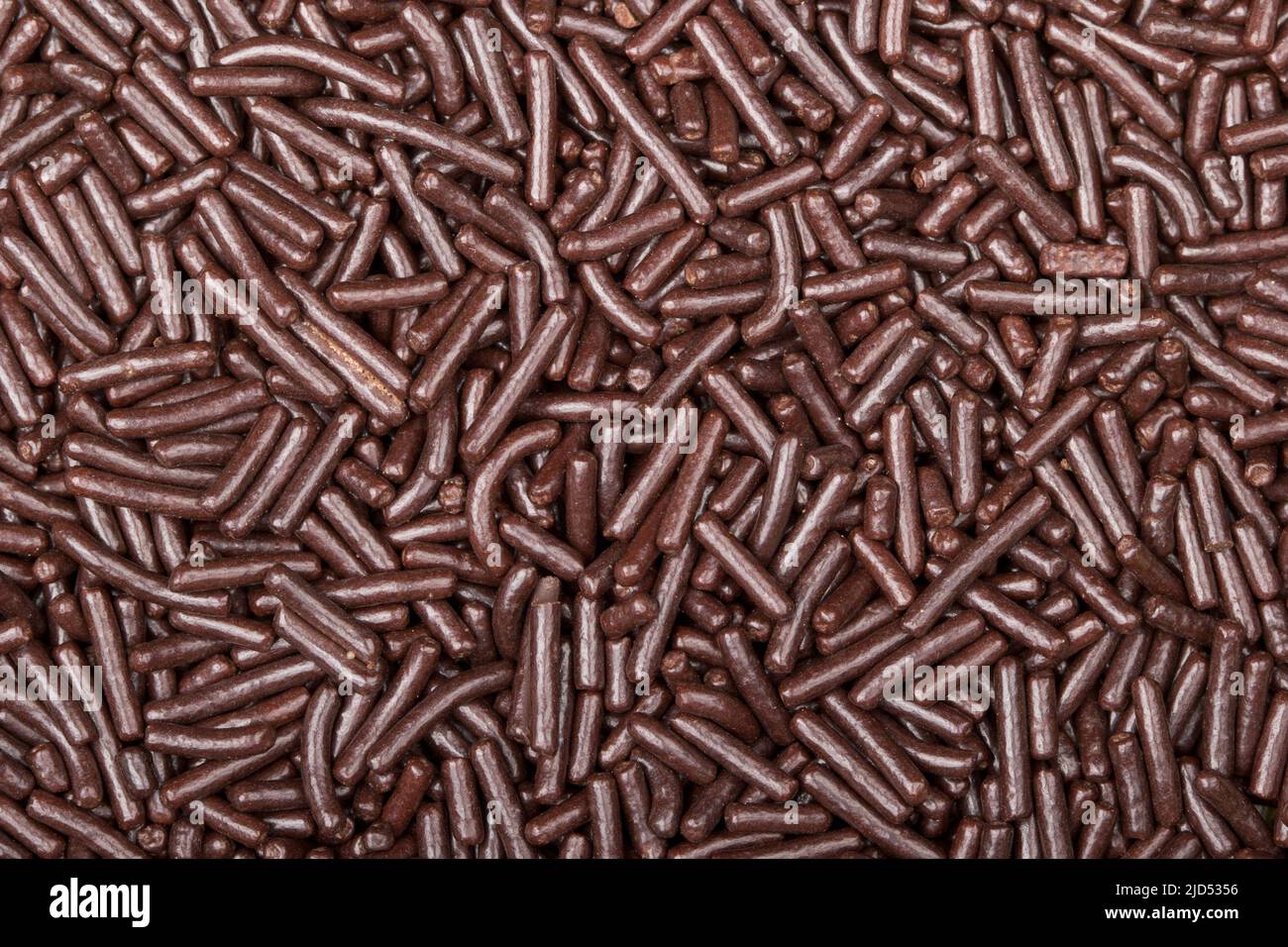 Macro shot of chocolate sprinkles texture background Stock Photo - Alamy