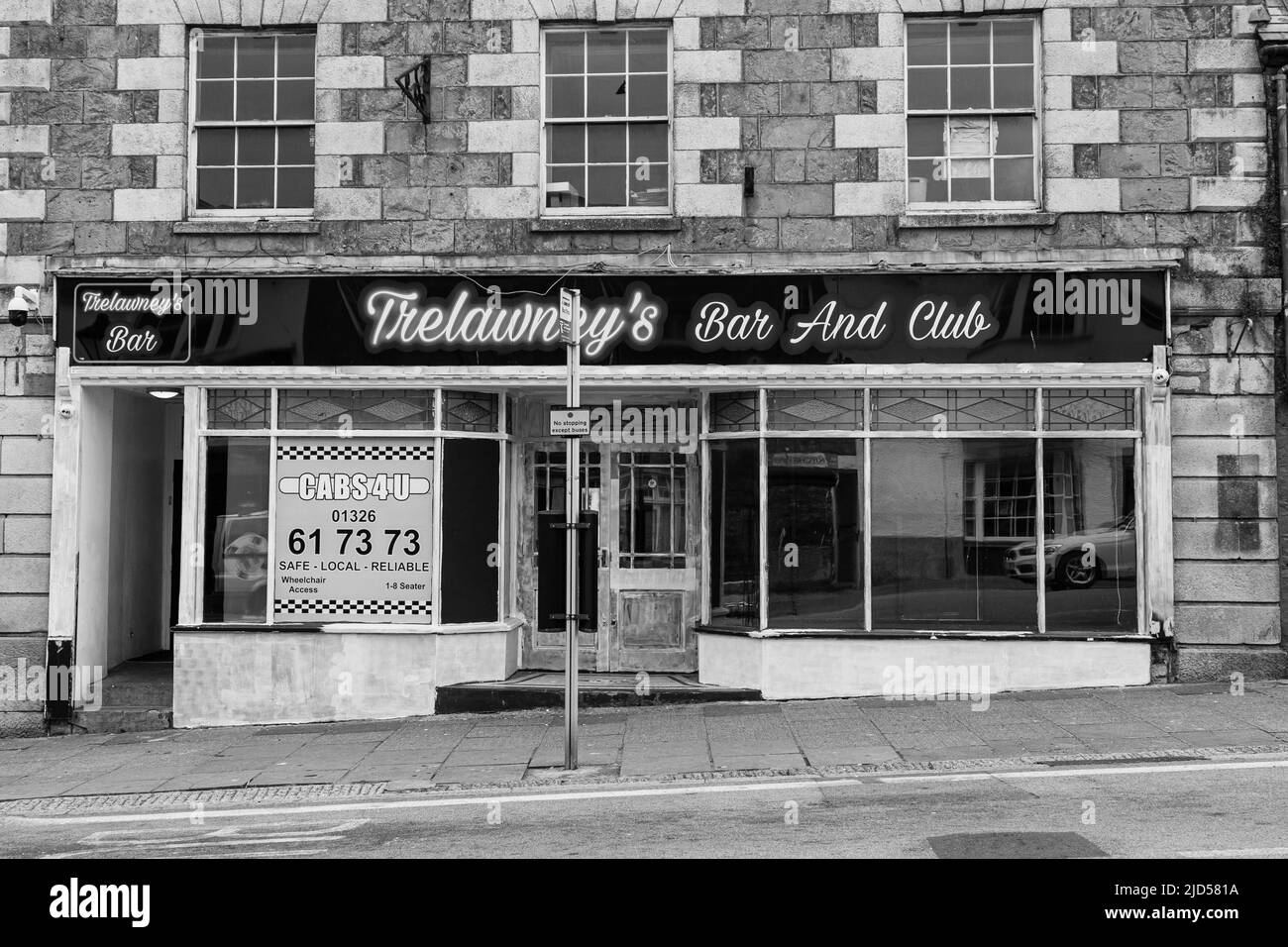 Retail outlets in Coinagehall Street, Helston, Cornwall, England Stock ...